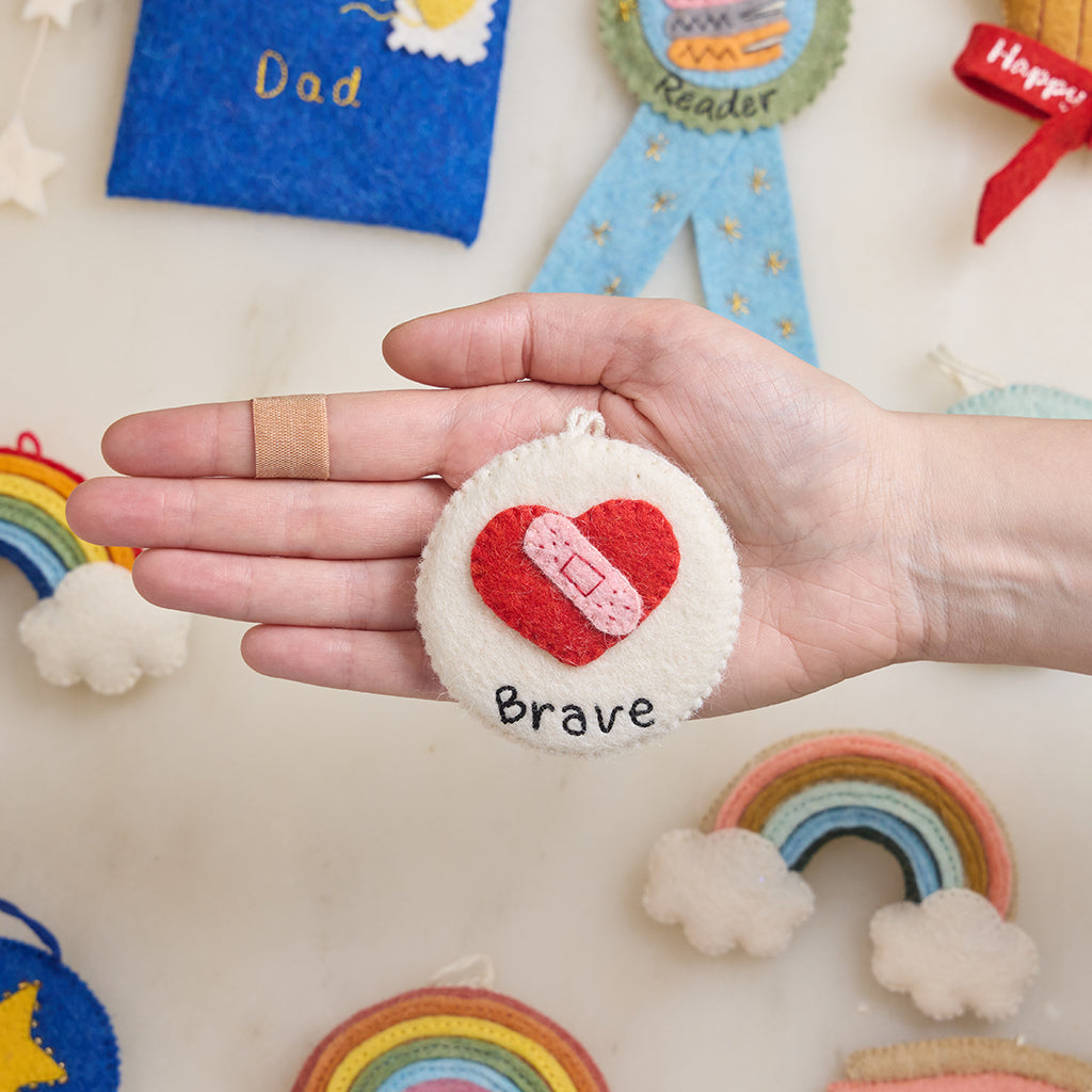 Hand Felted White Brave Badge with Red Heart and Band Aid – Craftspring